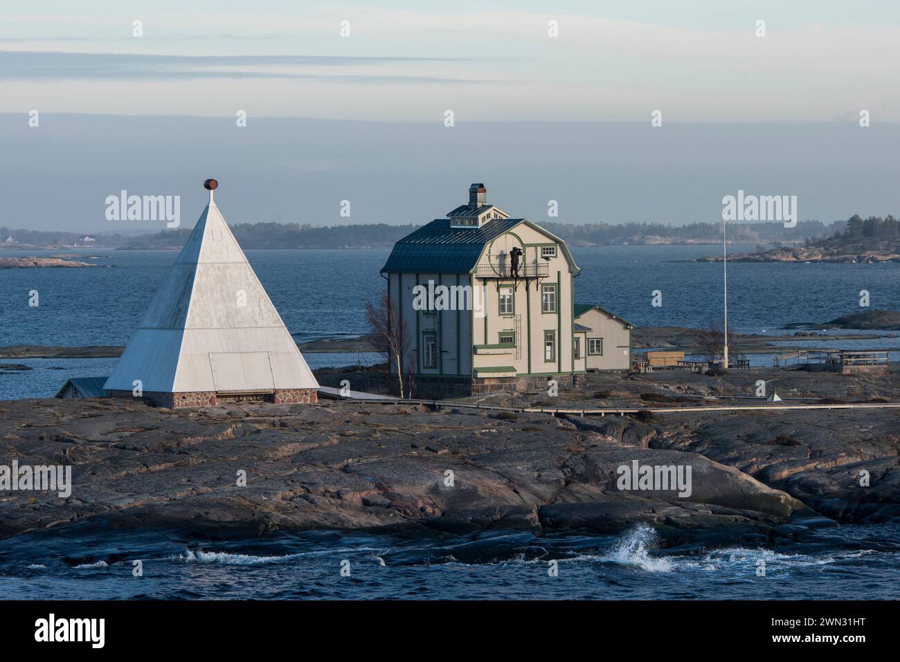 A House and a lighthouse on KOBBA KLINTAR in the Aland archipelago ...