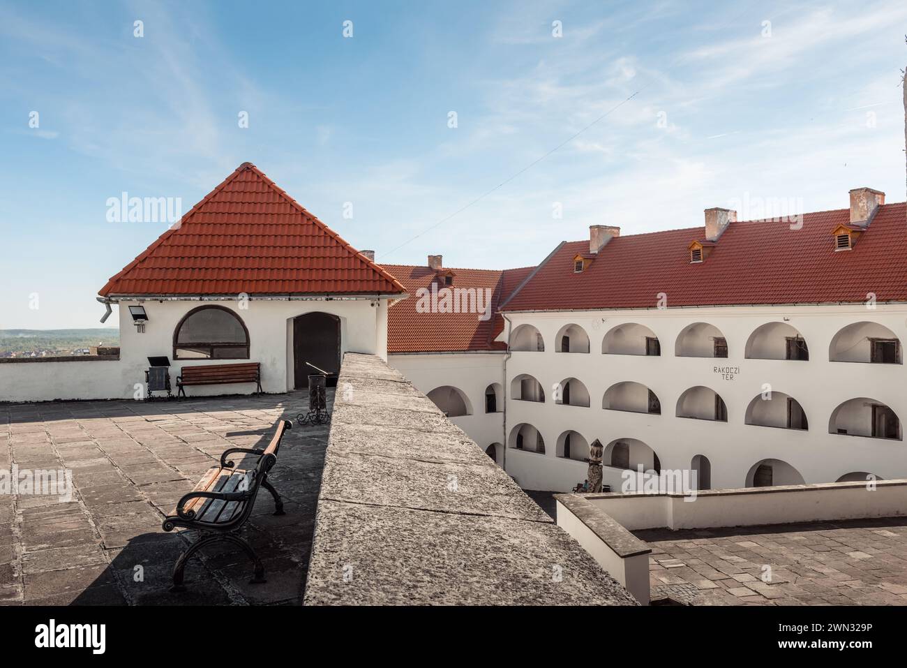 terrace overlooking interior courtyard of Palanok Castle on a sunny day ...