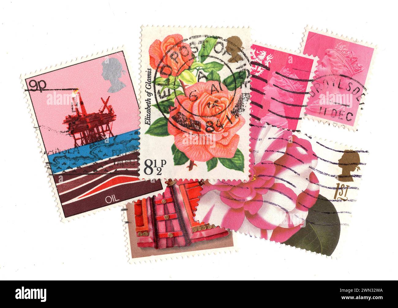 Vintage pink commemorative postage stamps from the United Kingdom ...