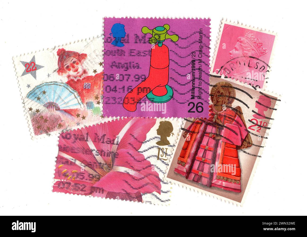 Vintage pink commemorative postage stamps from the United Kingdom ...