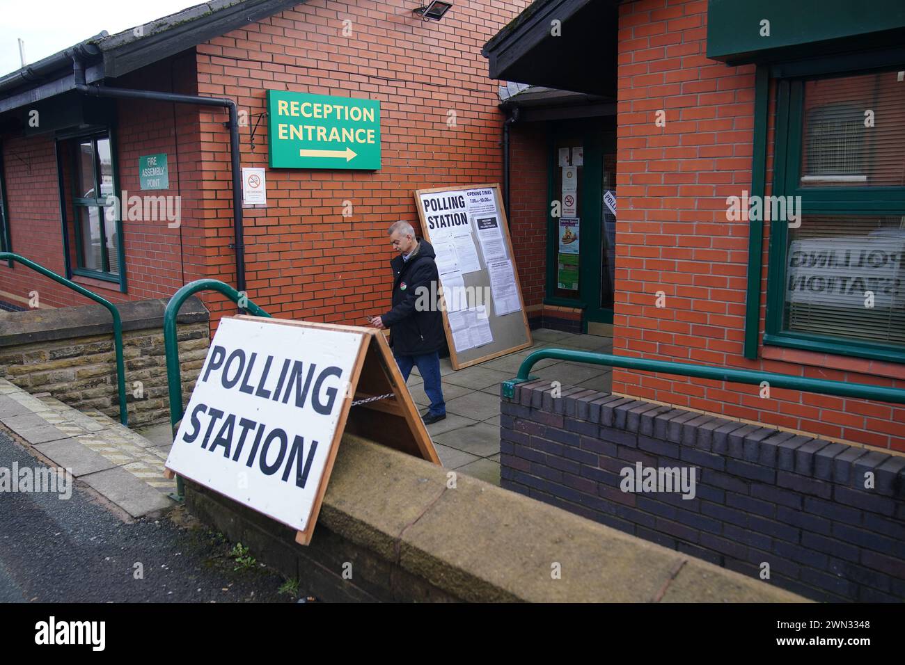 People at Deeplish Community Centre in Rochdale as voting begins in the ...