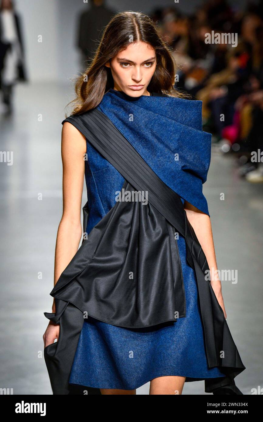 Paris, France. 27th Feb, 2024. A model walks the runway during the ...