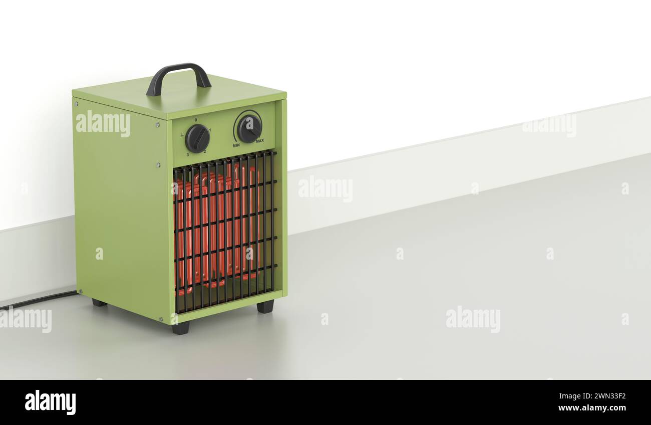 Heating the room with green electric fan heater Stock Photo - Alamy