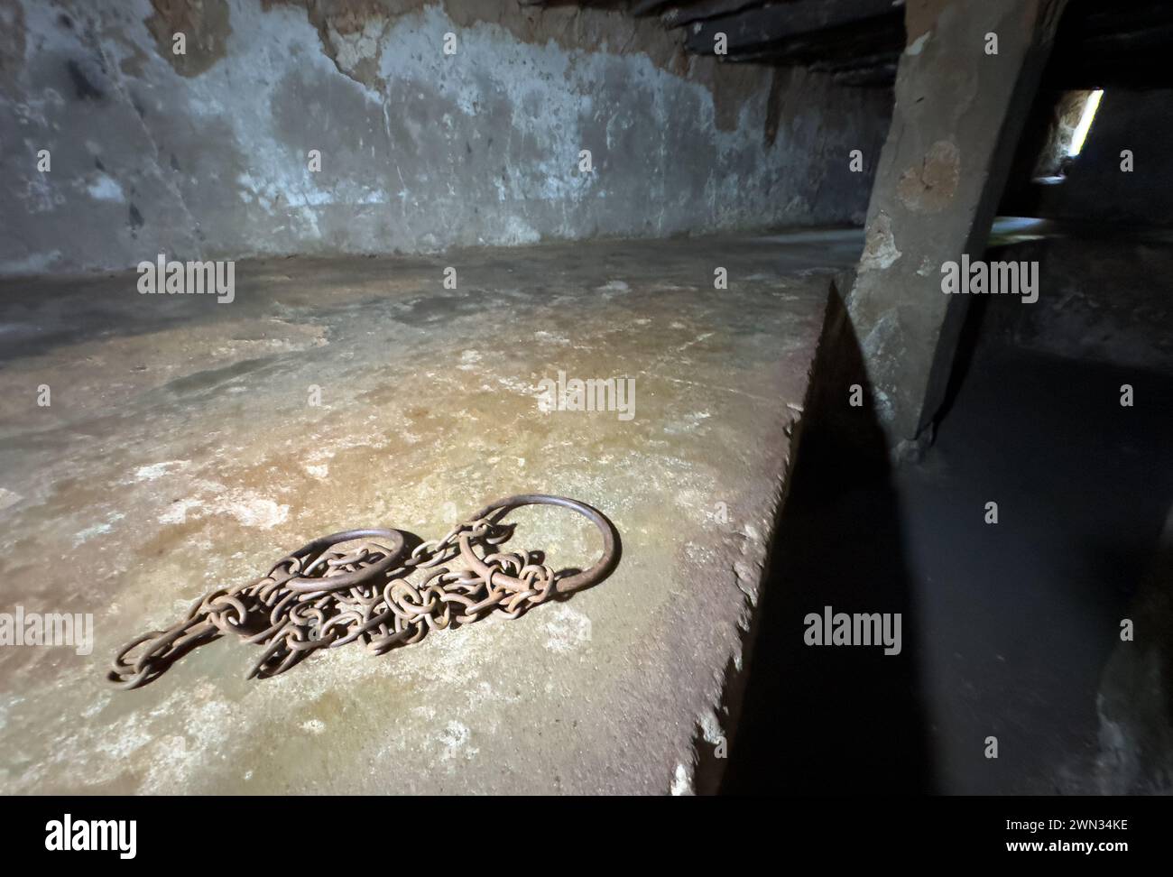 Manacles in an underground holding pen for 50 slaves in the old Slave ...