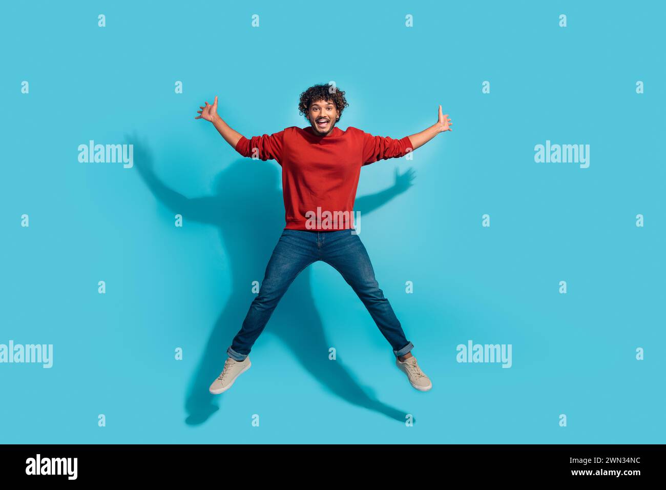 Full body size photo of overjoyed energetic mexican man jumping raised ...