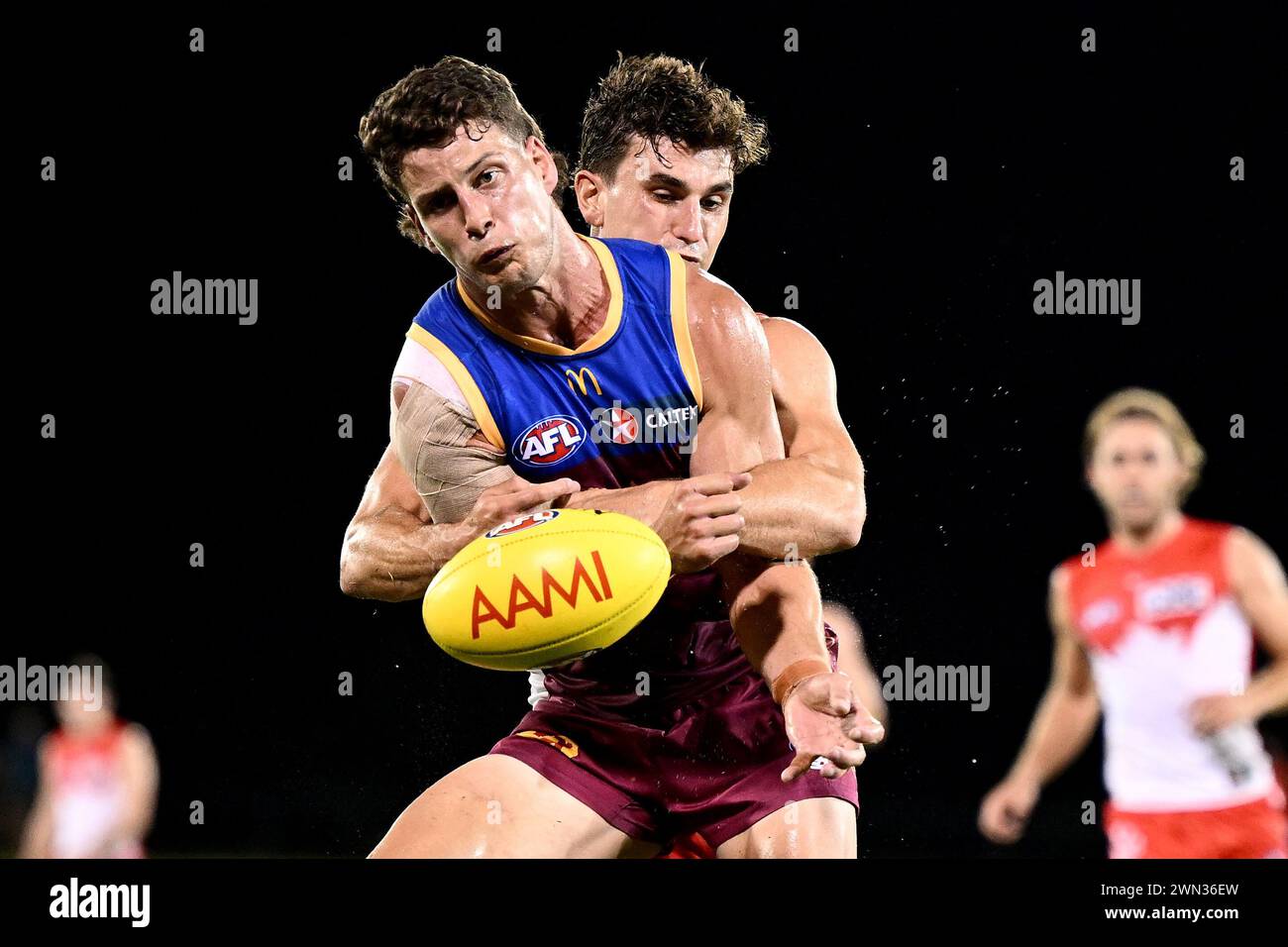 Sydney, Australia. 29th Feb, 2024. Jarrod Berry of the Lions is tackled ...
