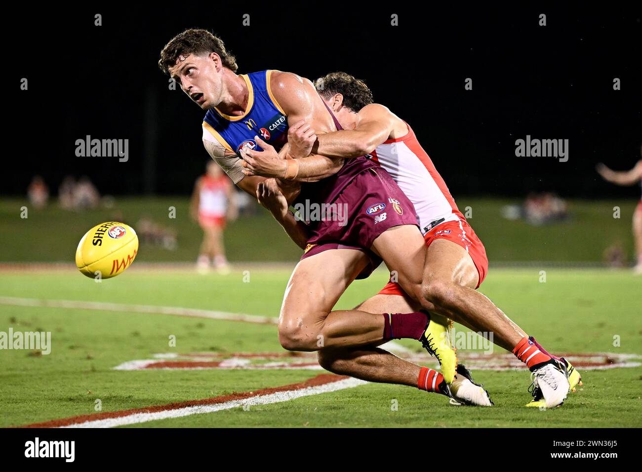 Sydney, Australia. 29th Feb, 2024. Jarrod Berry of the Lions is tackled ...