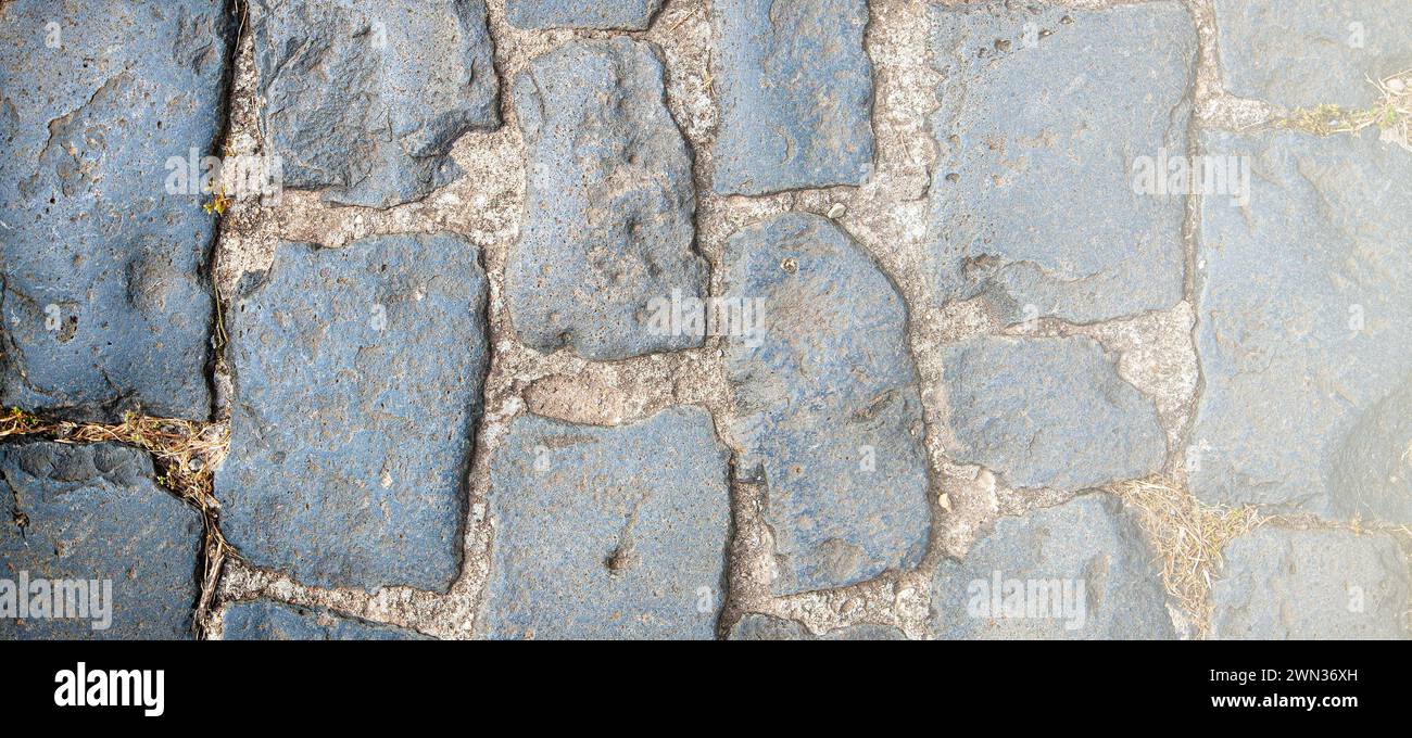 The Granite cobblestoned pavement background on sunlight Stock Photo ...