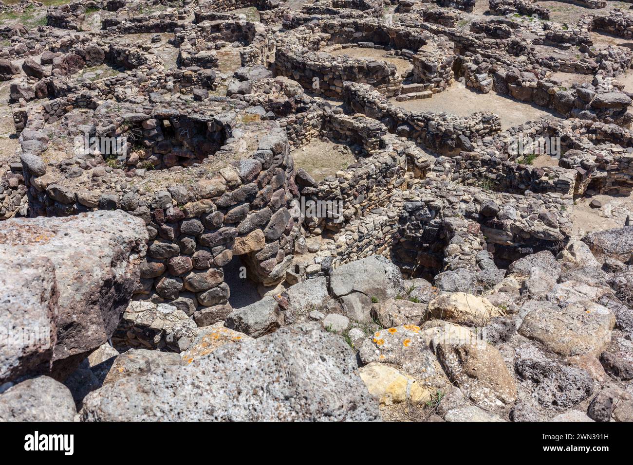 nuragic ruins of the archaeological site of Barumini in Sardinia with a ...