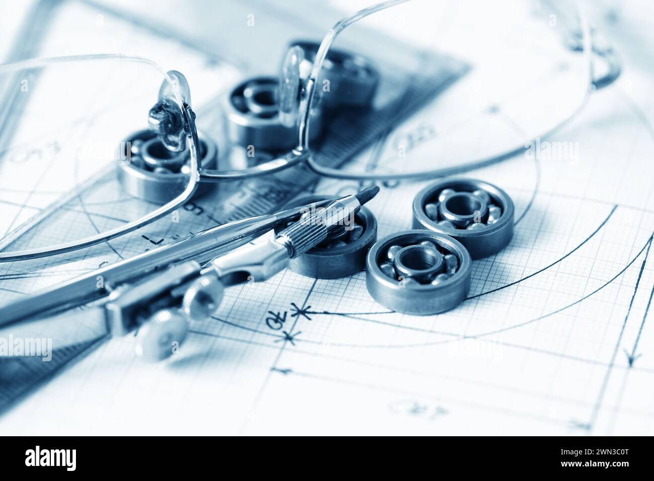 Set of old drawing tools on background with graph paper Stock Photo - Alamy
