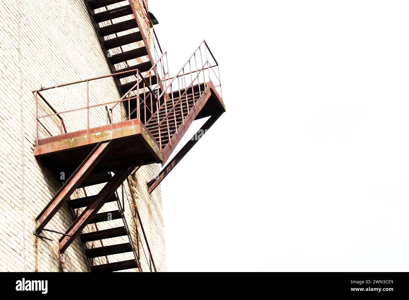 Industrial background. Closeup of high brick wall of old factory with ...
