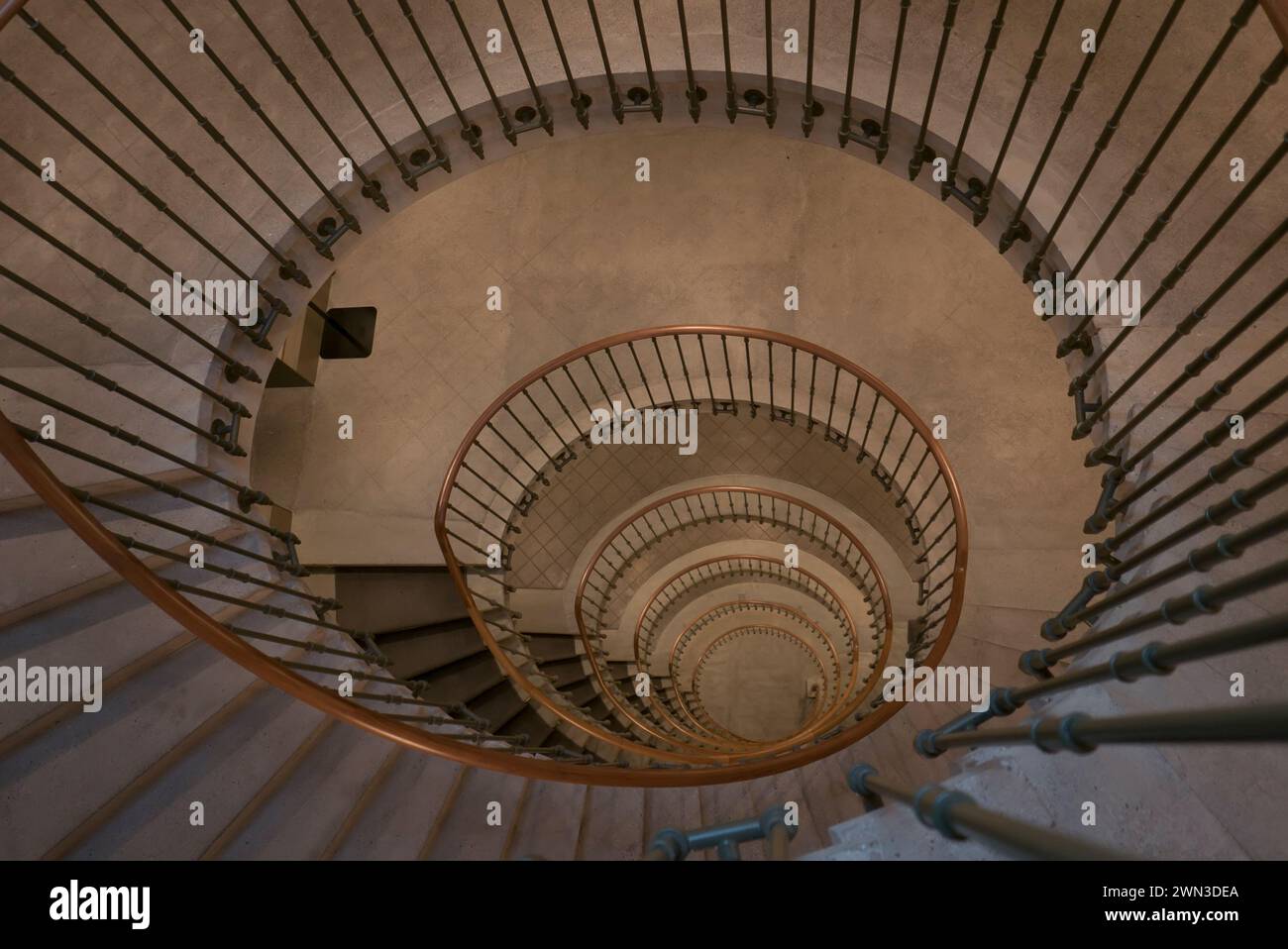 view of the bottom of a spiral staircase Stock Photo - Alamy
