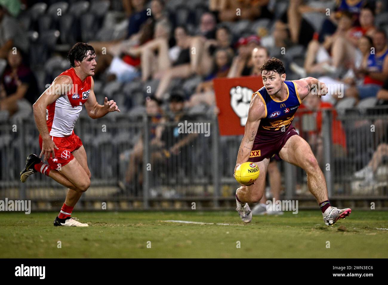 Sydney, Australia. 29th Feb, 2024. Lachie Neale of the Lions looks to ...