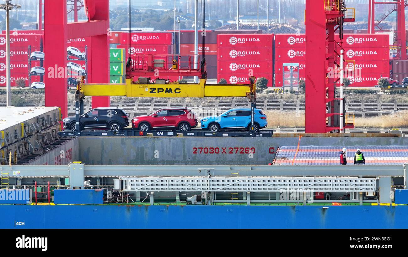Aerial photo shows vehicles are stacked up for export in Taicang Port ...