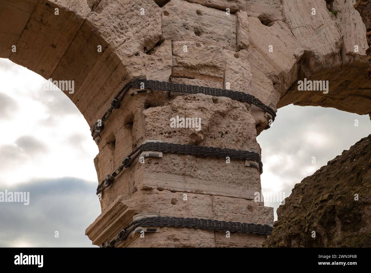 the protection on the column of colosseum in Rome, Italy Stock Photo ...