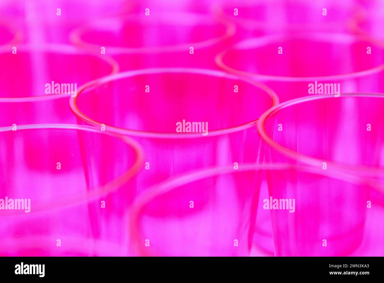 Plastic pink cups Stock Photo - Alamy