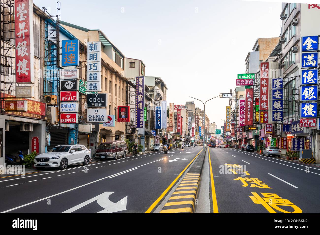 Bustling urban street with colorful signboards in Tainan, Taiwan Stock ...