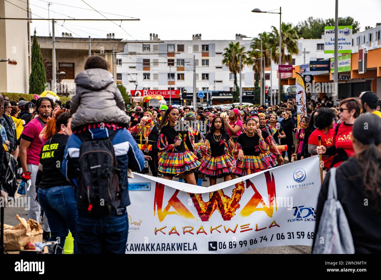 Crowd marching in parade with flags, people walking Stock Photo - Alamy