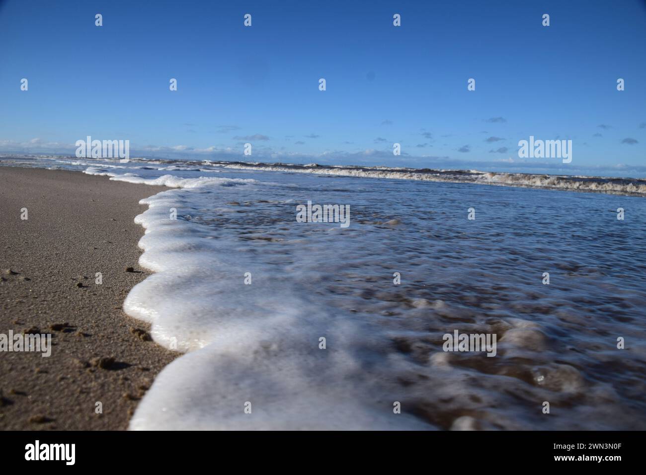 The sand dunes and beach along the Merseyside coast facing onto ...