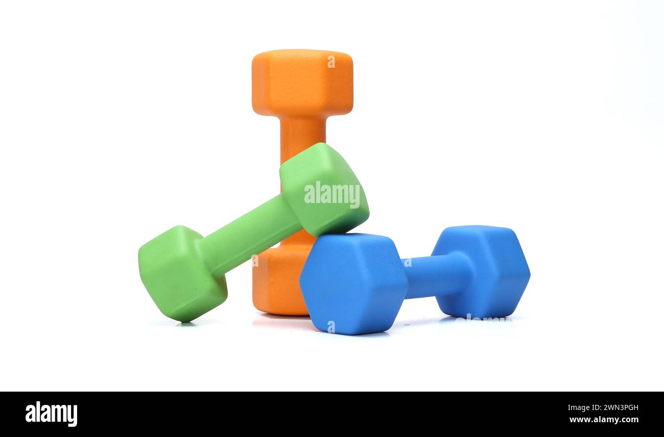 colorful rubber coated dumbbells isolated on white background Stock ...