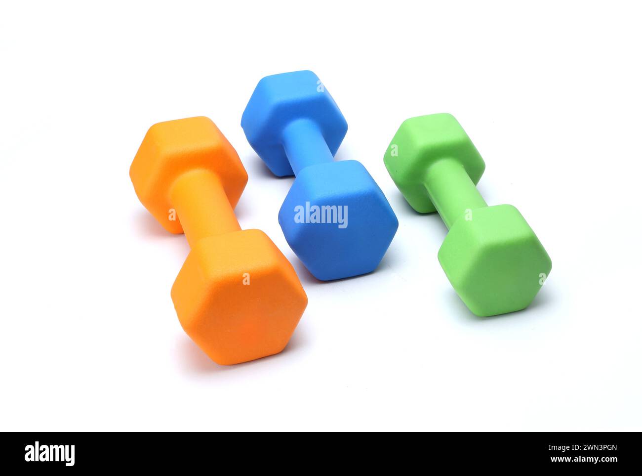 colorful rubber coated dumbbells isolated on white background Stock ...