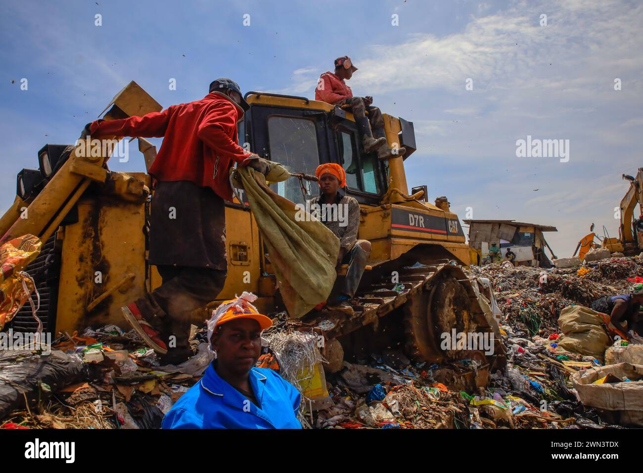 Nairobi, KENYA. 28th Feb, 2024. Waste collectors scavenge for ...