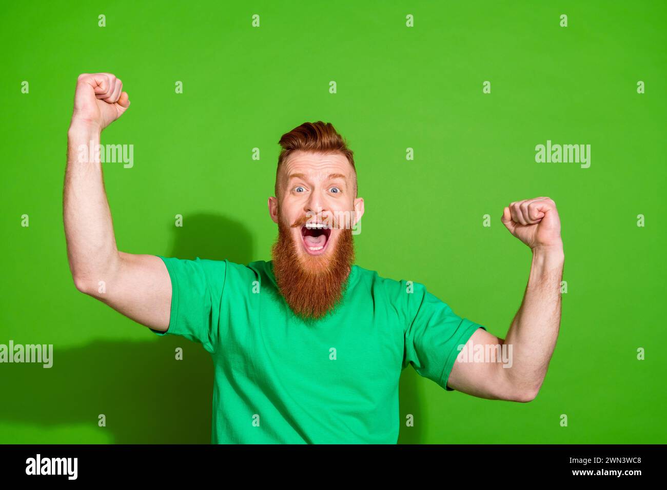 Portrait of overjoyed crazy guy with long red beard wear stylish t ...