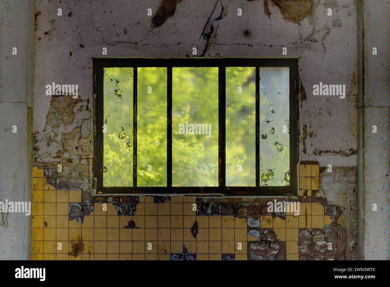 Broken security window Stock Photo - Alamy