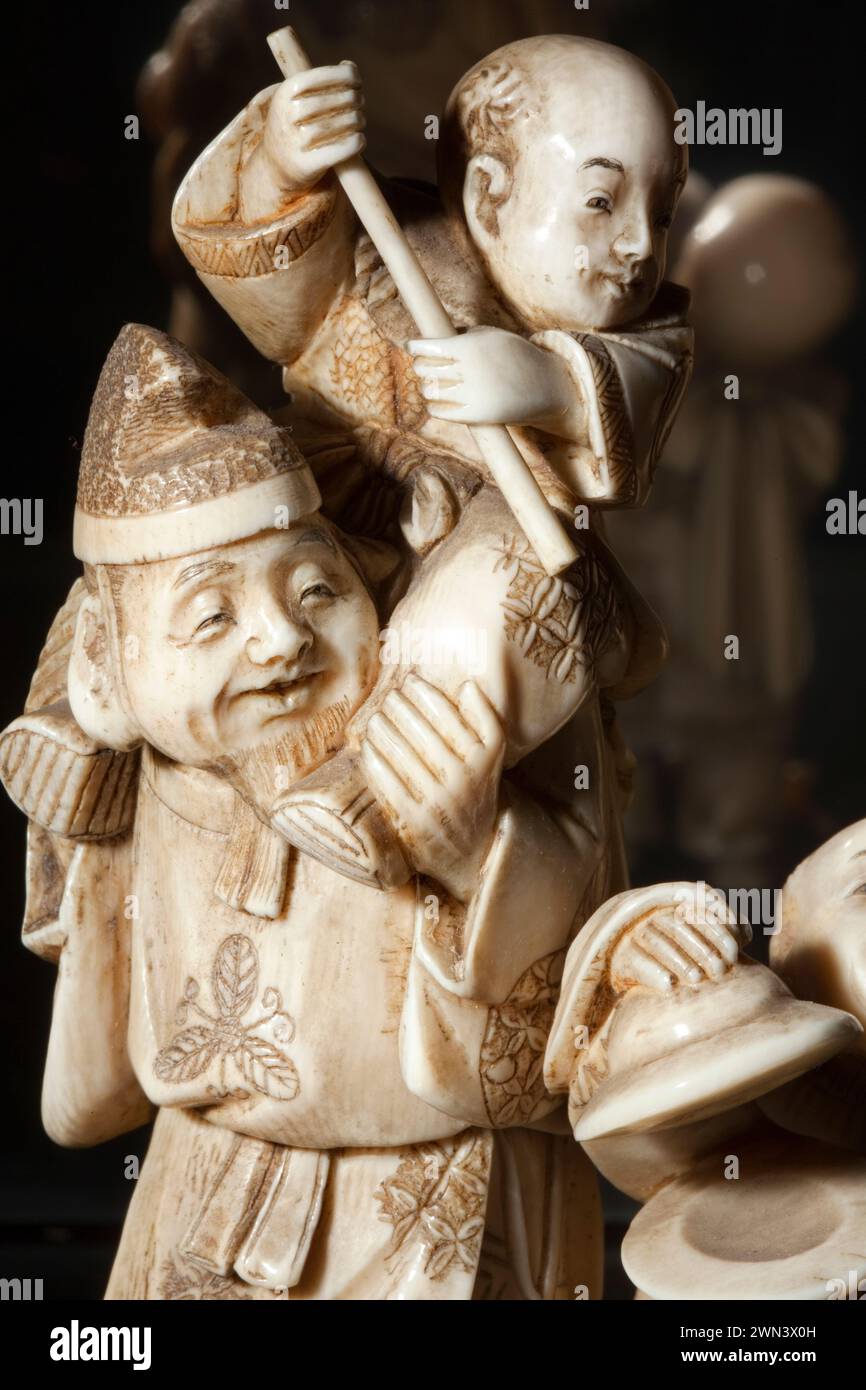 Carved ivory figures from East Asia Stock Photo - Alamy
