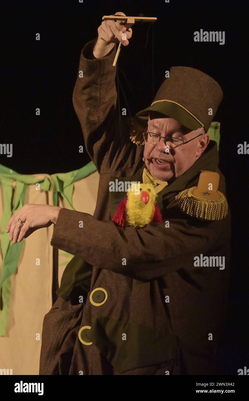 American puppeteer performs with puppets during Tripura International ...