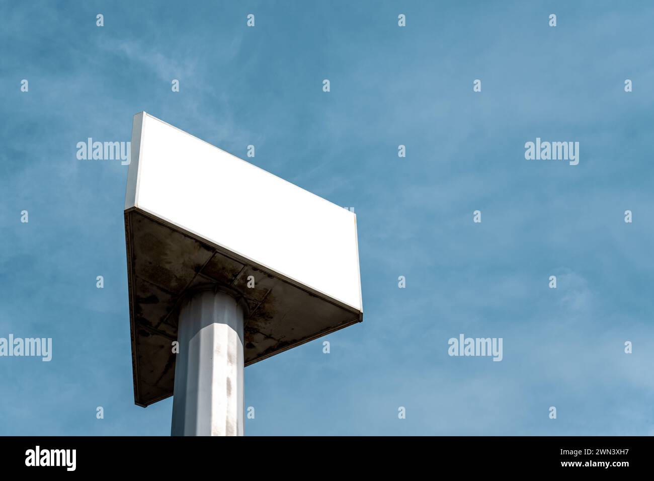 Blank open air billboard megaboard mock up in the city on sunny day ...