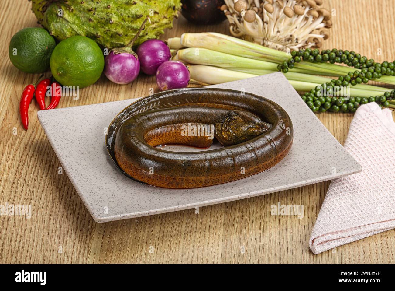 Fresh raw uncooked eel for grill in the bowl Stock Photo - Alamy