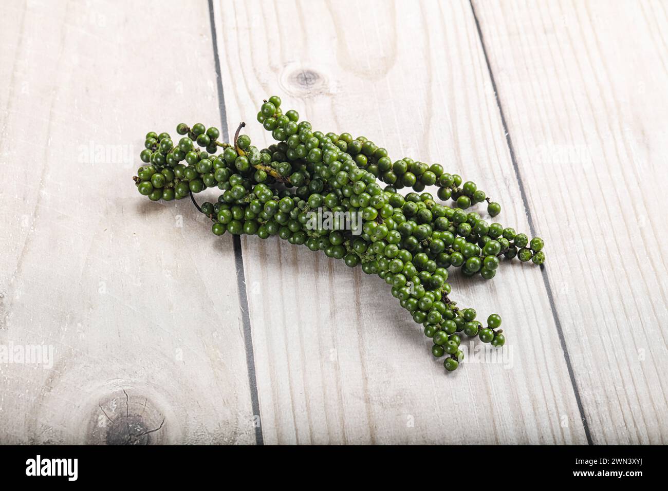 Fresh ripe green peppercon heap isolated Stock Photo - Alamy