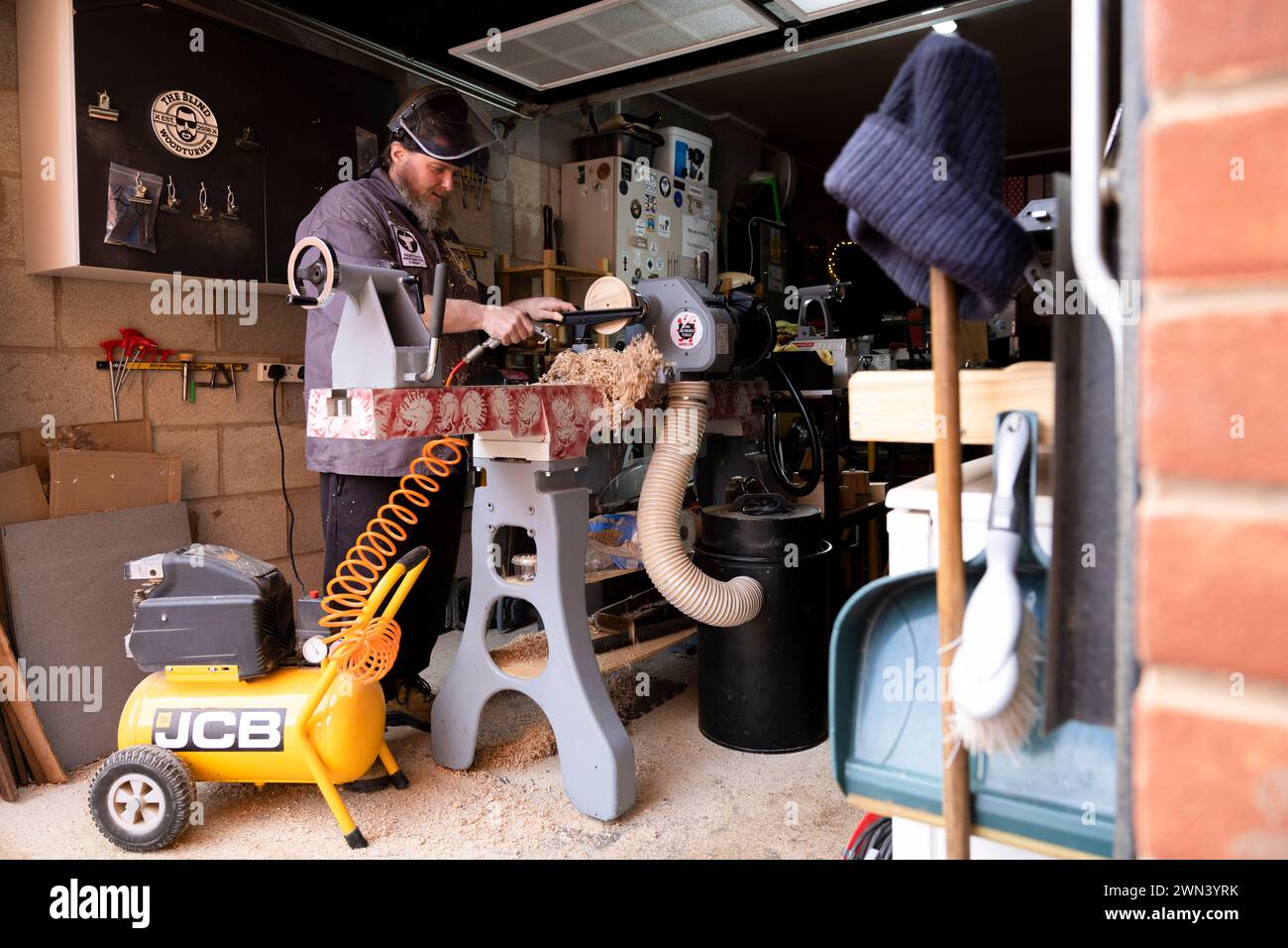 14/04/22 Chris uses a JCB air compressor to blow away saw-dust ...