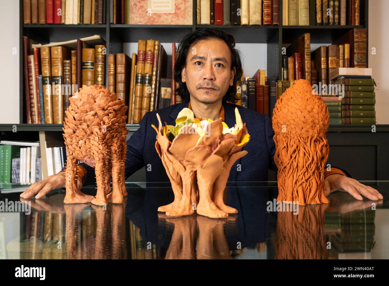 London, UK. 29 February 2024. Artist Temsuyanger Longkumer with some ...