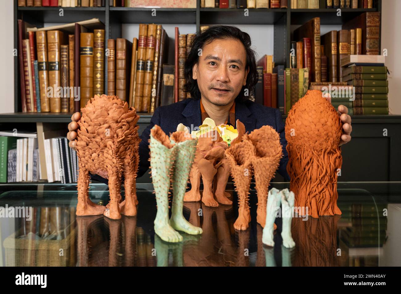 London, UK. 29 February 2024. Artist Temsuyanger Longkumer with some ...