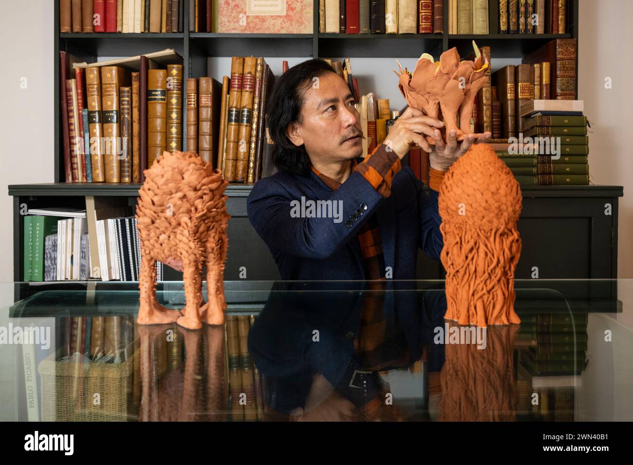 London, UK. 29 February 2024. Artist Temsuyanger Longkumer with some ...