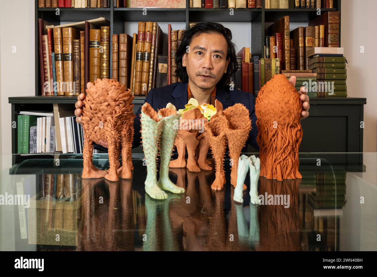 London, UK. 29 February 2024. Artist Temsuyanger Longkumer with some ...