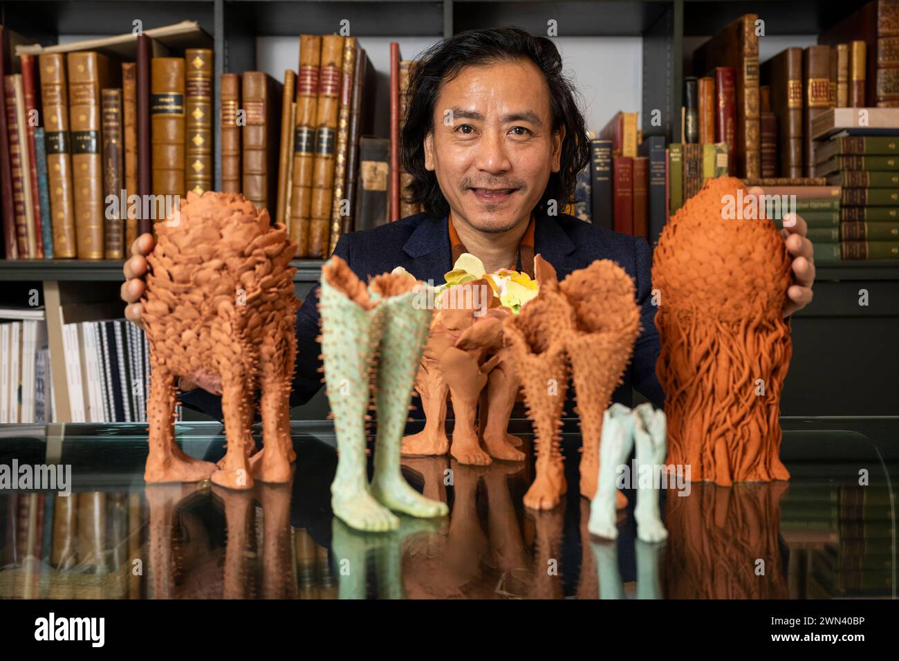 London, UK. 29 February 2024. Artist Temsuyanger Longkumer with some ...