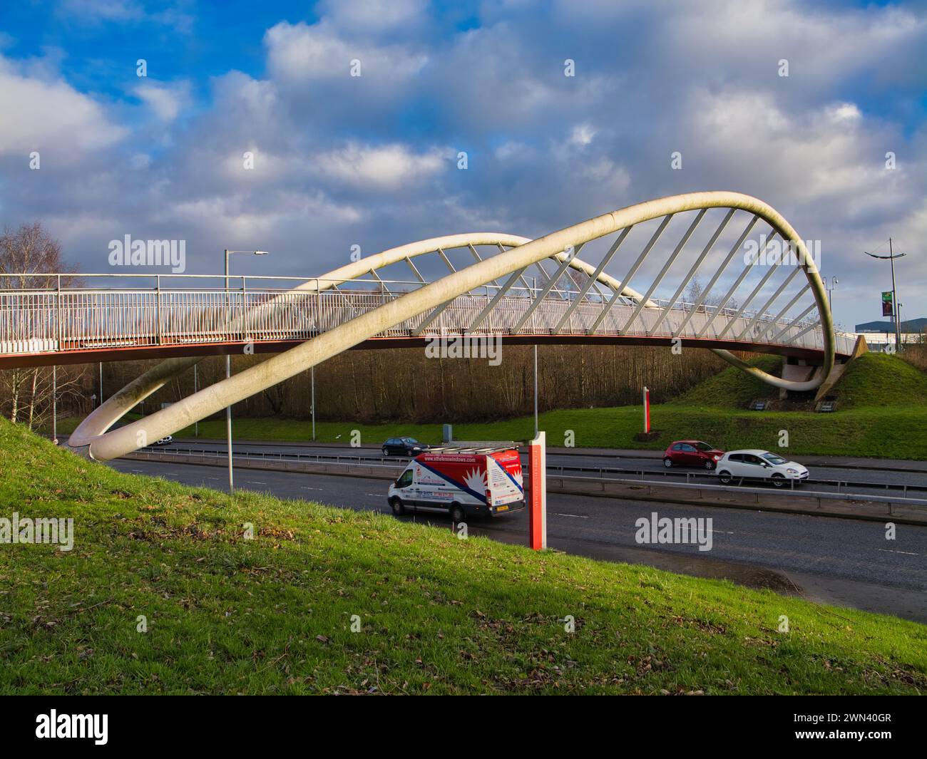 St Helens, UK - 4 Jan 2024: The Steve Prescott Bridge across the A58 in St Helens, Merseyside ...