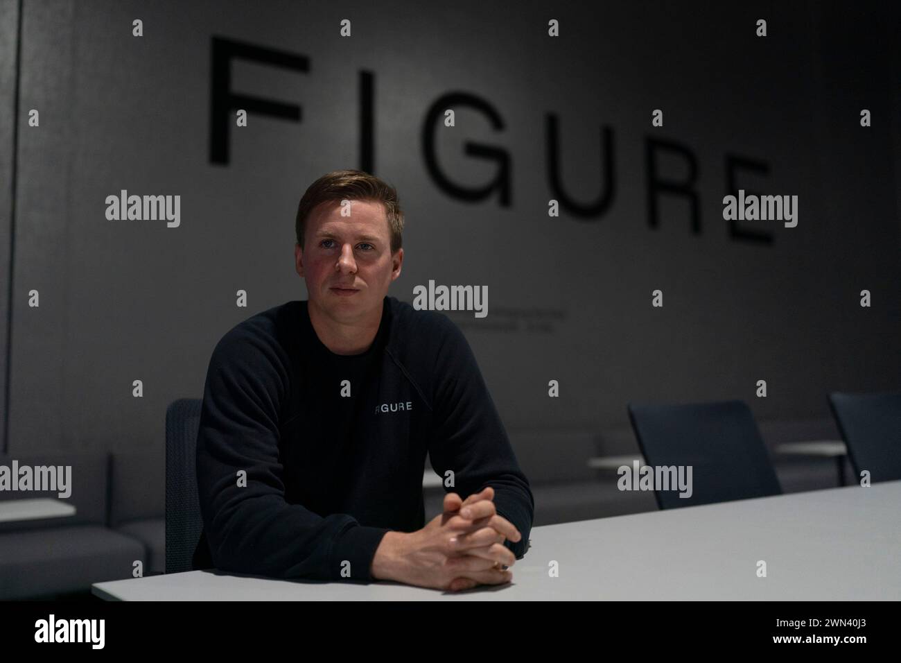 FILE - Figure AI CEO Brett Adcock sits for a photo at the company's ...