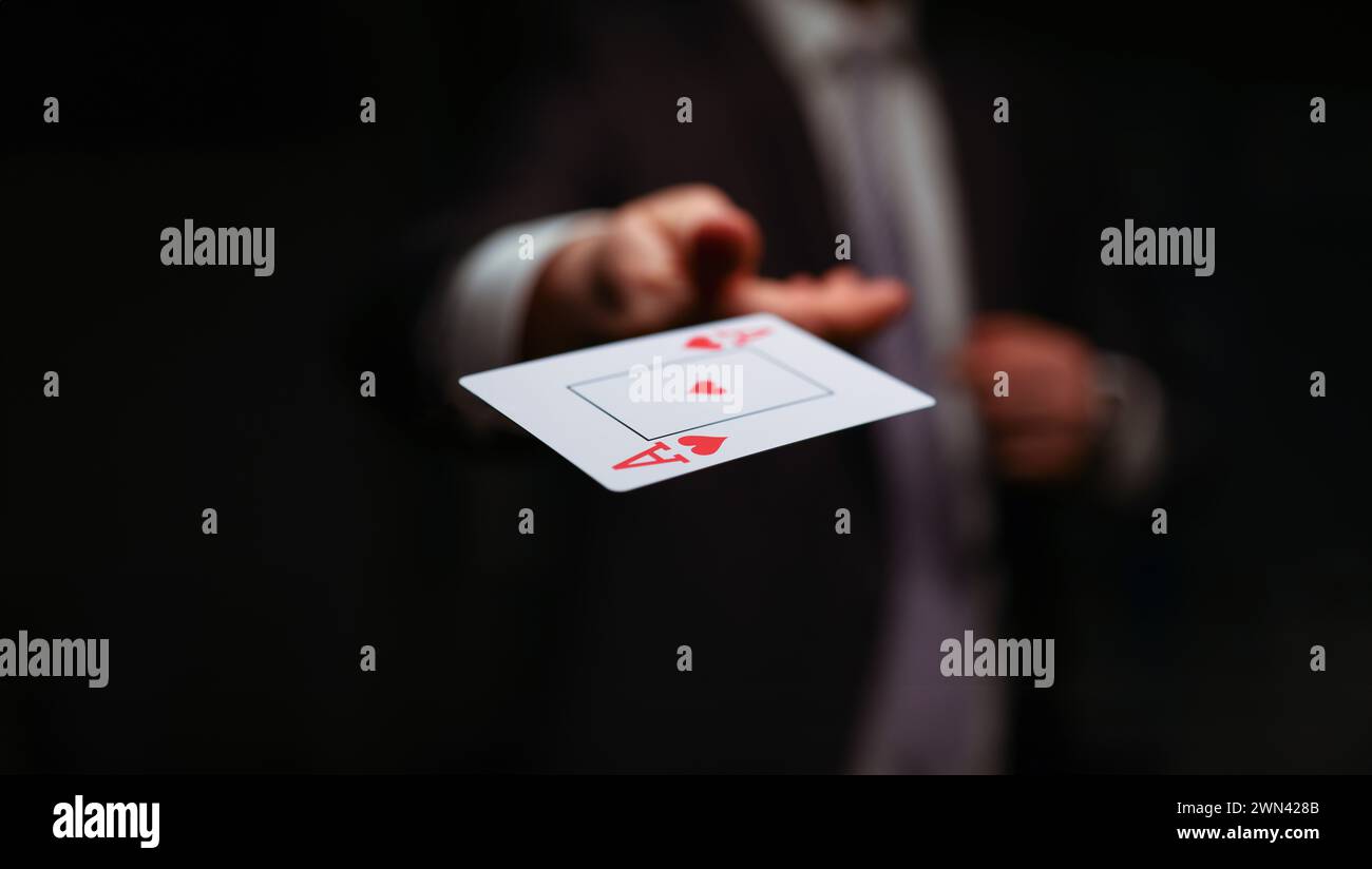 Male magician in black suit hi-res stock photography and images - Alamy