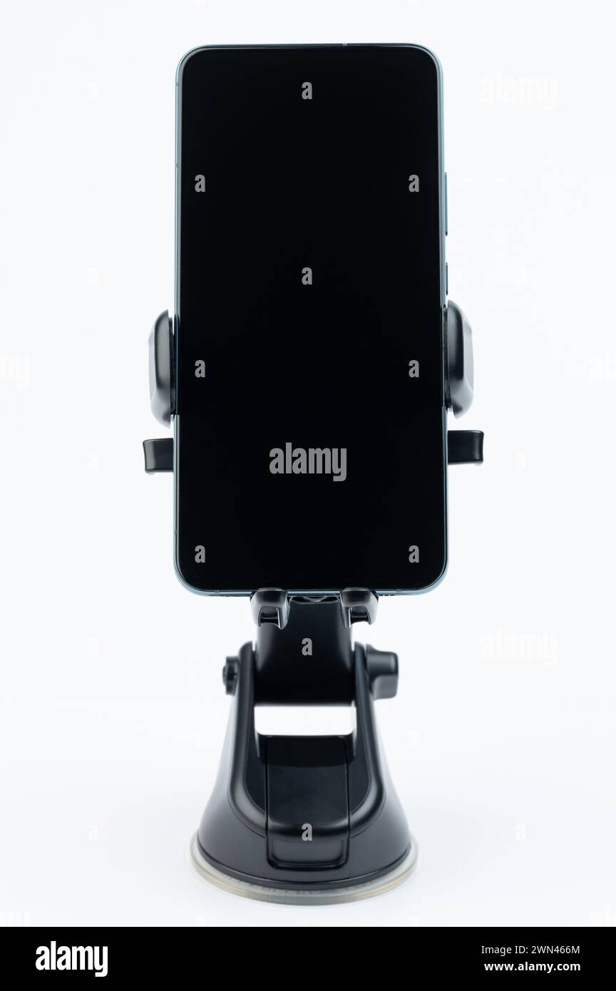 Modern smartphone in car mount holder front view isolated Stock Photo ...