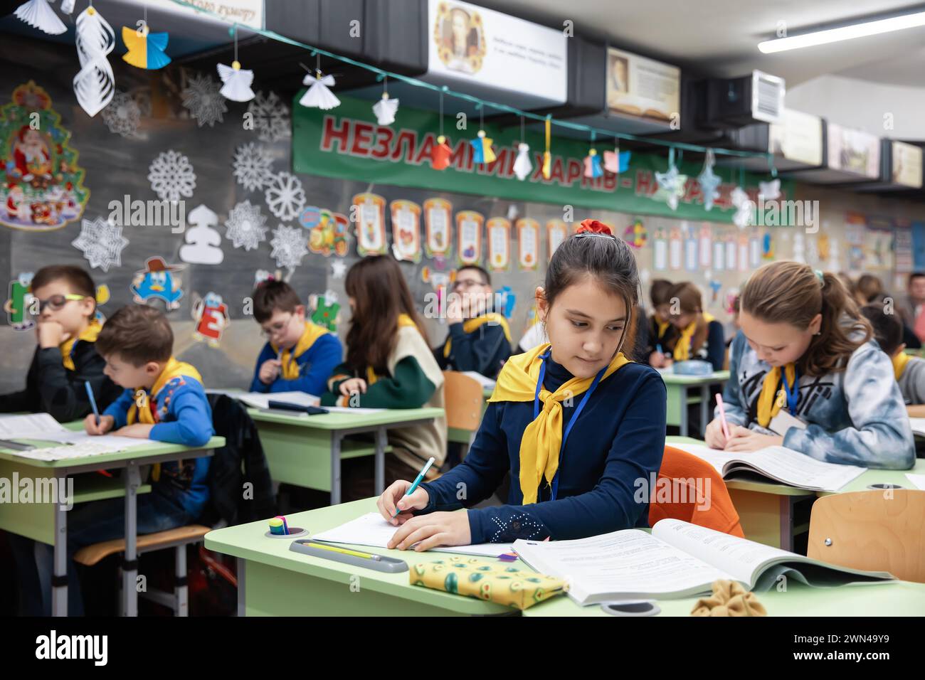 Kharkiv, Ukraine. 19th Dec, 2023. Children are seen during class lesson at school. Ukrainian ...