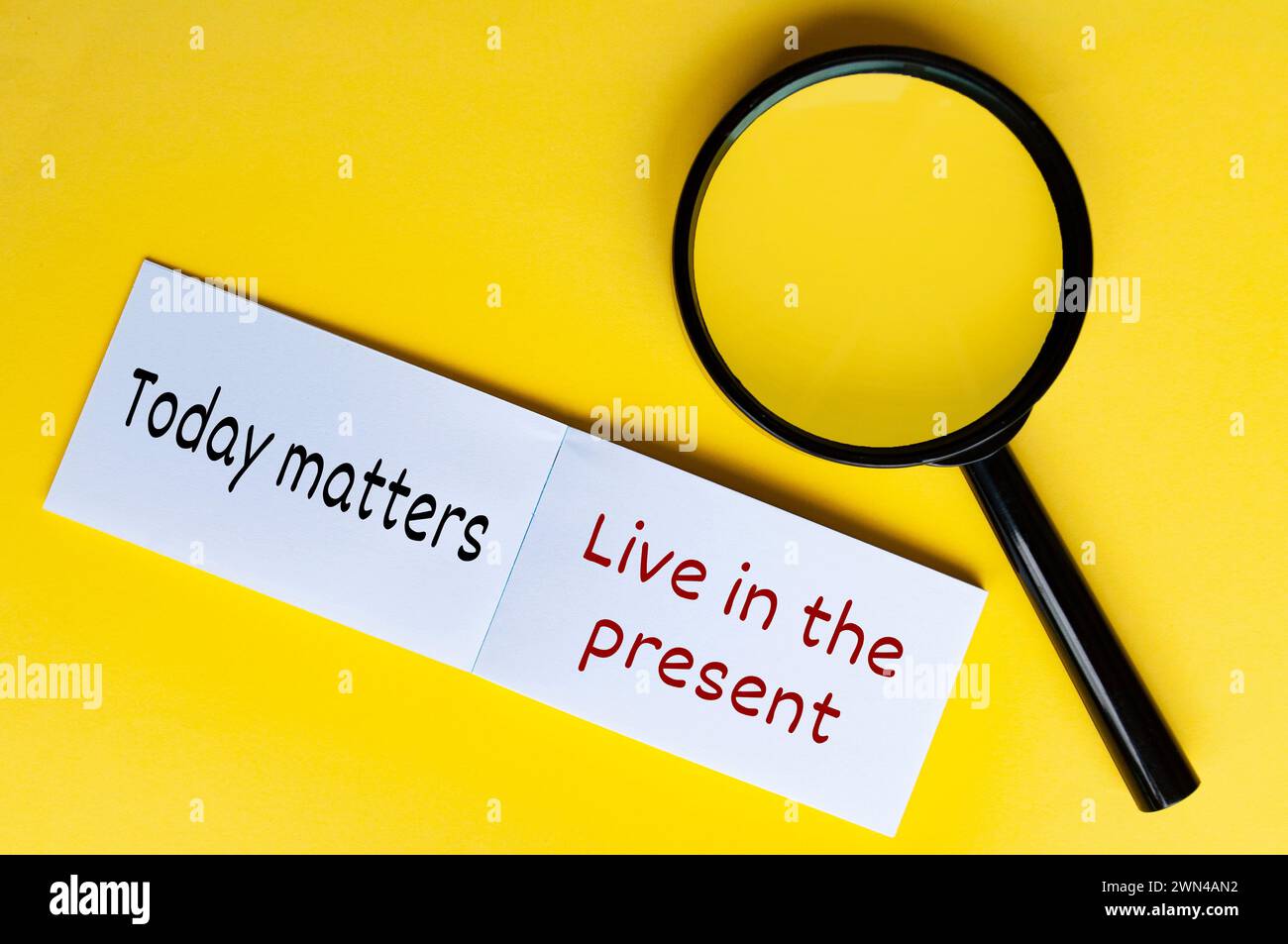 Today matters text on white notepad with magnifying glasses on yellow ...