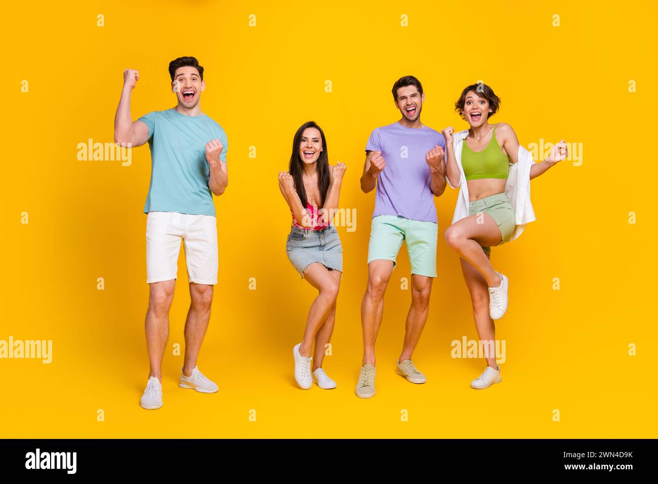 photo of crazy positive cheerful youngster winning raise fists up ...