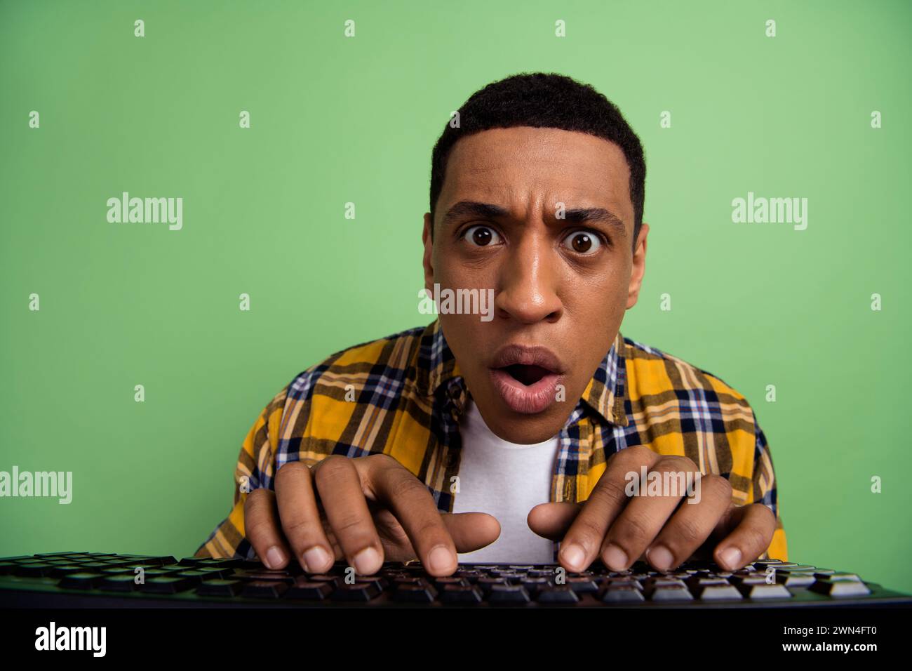 Portrait of speechless crazy person open mouth staring fingers typing ...