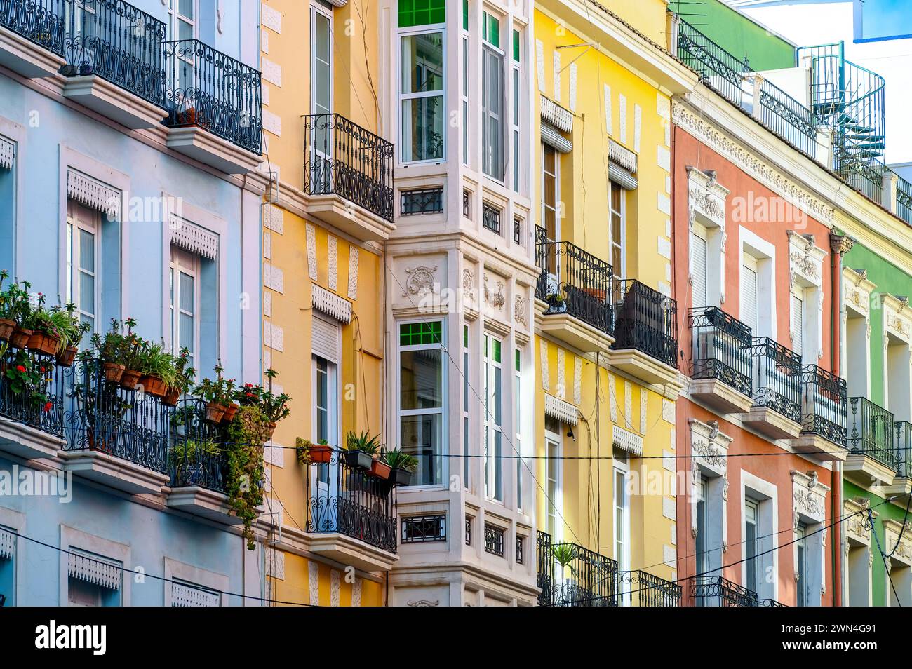 Multi-color facades of residential buildings in Alicante, Spain Stock ...