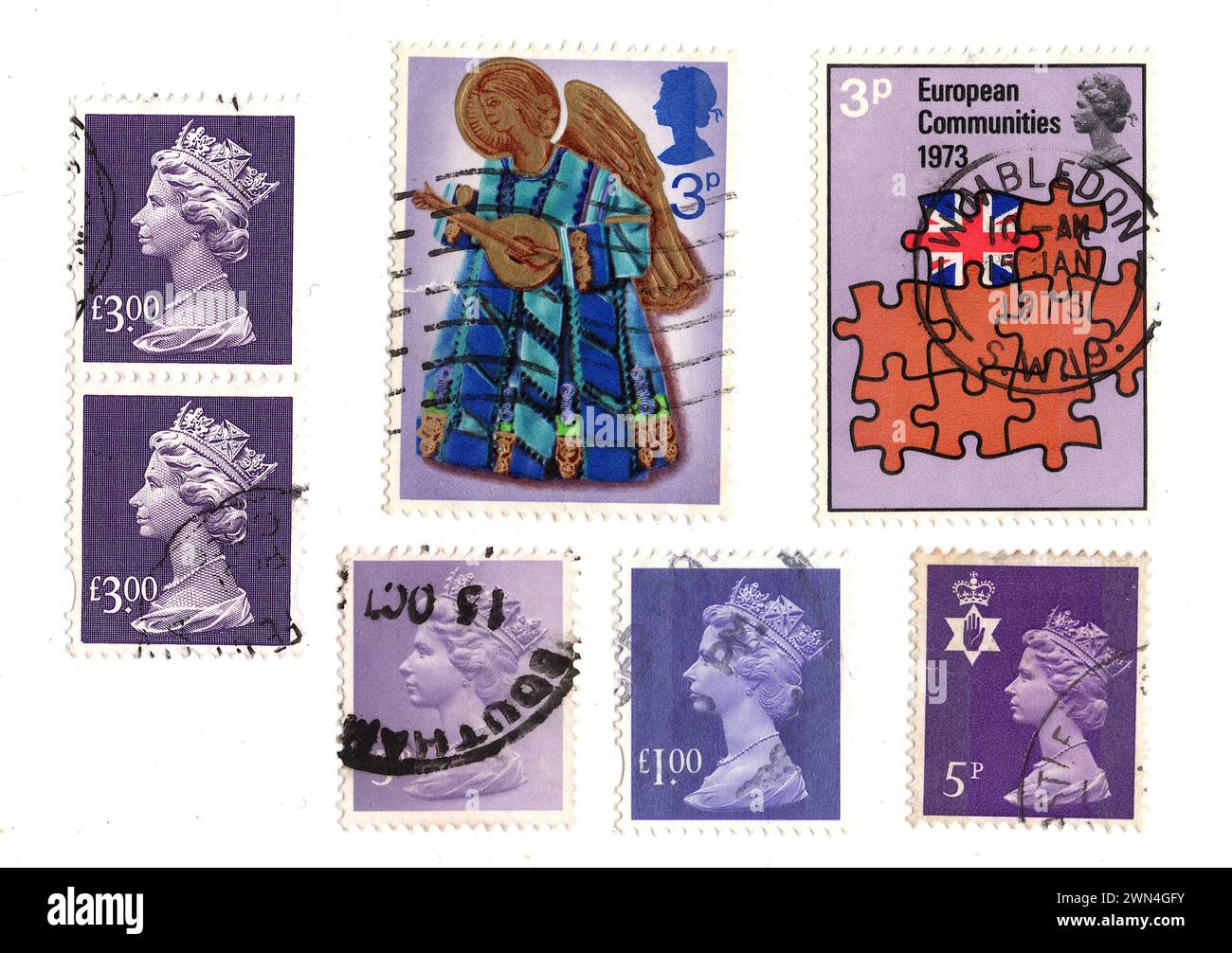 Vintage purple commemorative postage stamps from the United Kingdom ...