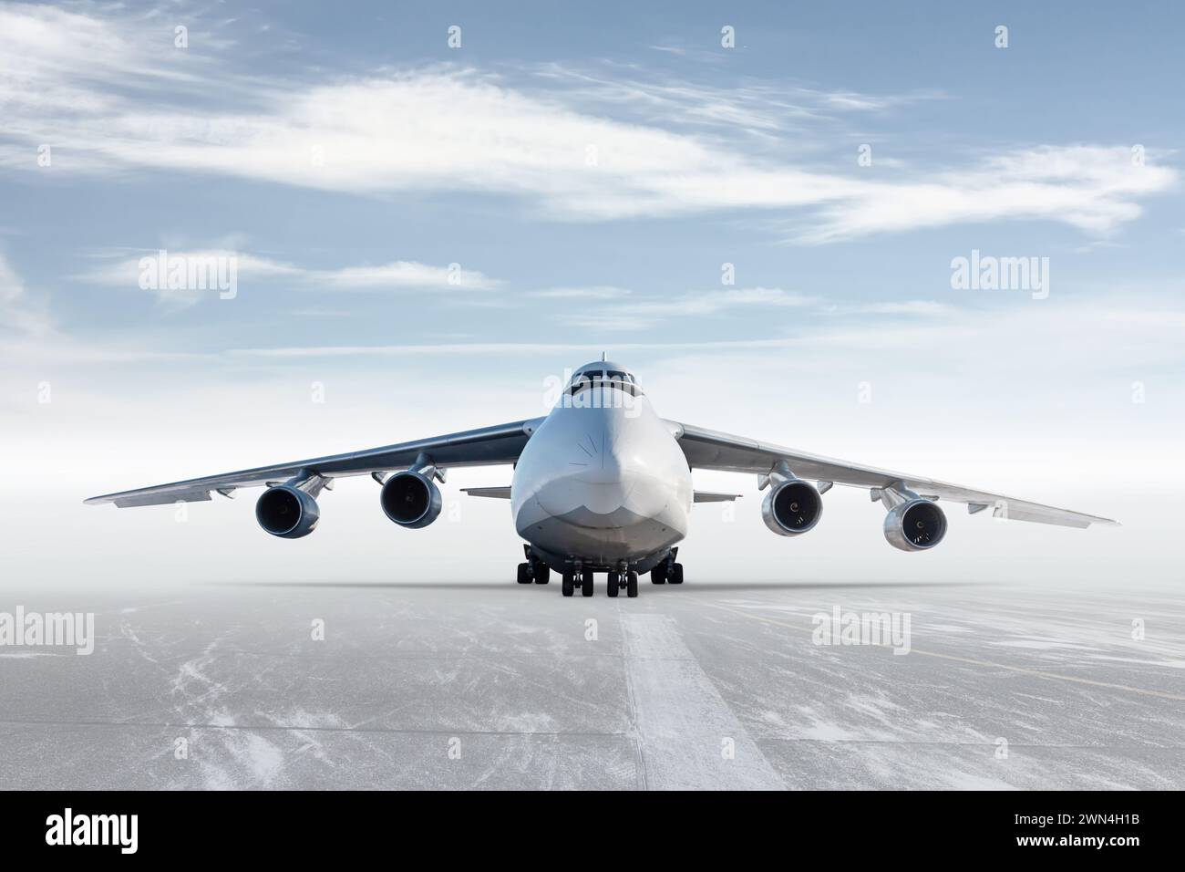 Front view of the white wide body transport cargo jet plane isolated on ...